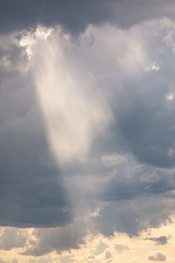Vivid Sunbeam Light Ray from Clouds Stock Image - Image of clouds ...
