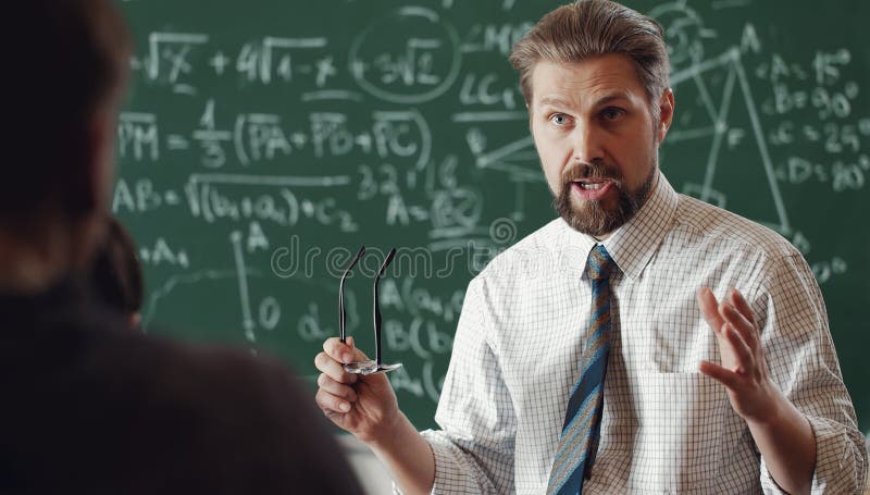 Professor Explaining Theme To Student Stock Photos - Free & Royalty ...
