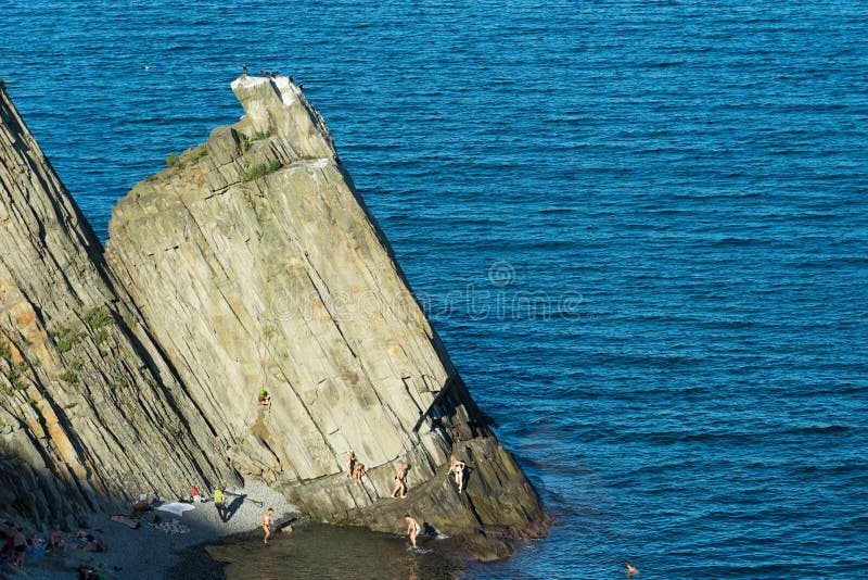 Coastal Rocks Triangular Shape on the Background of the Sea Editorial ...