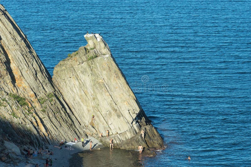 Coastal Rocks Triangular Shape on the Background of the Sea Editorial ...
