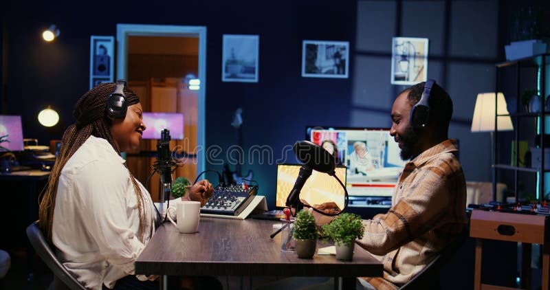 Vlogger Show Host and Guest Using Smartphone on Tripod To Record ...