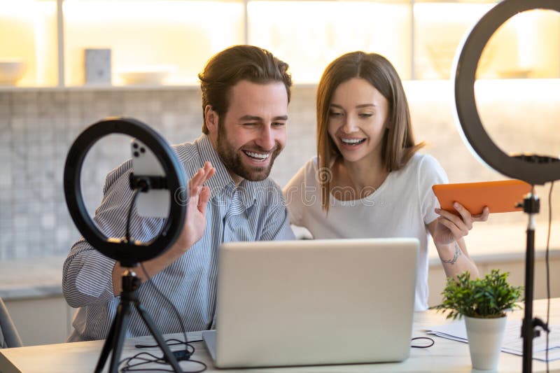 Two Vloggers Having Online Tutorial and Looking Involved Stock Image ...