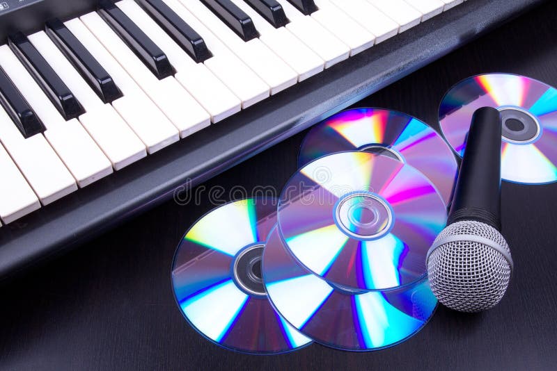 Vocal Microphone,cd Discs and Electronic Keyboard Stock Photo - Image ...