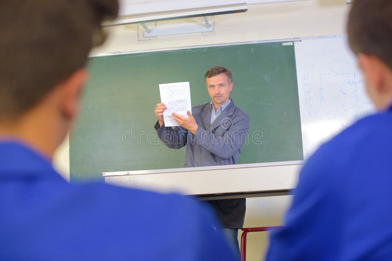 Vocational Teacher in Class Stock Photo - Image of teamwork, middle ...