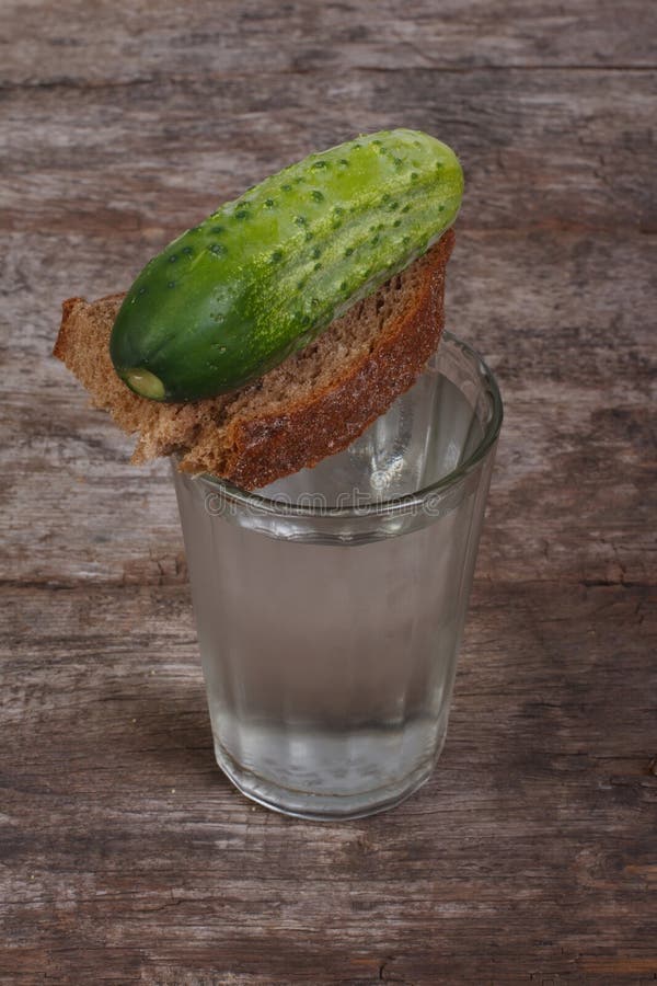 Vodka, Bread and Cucumber on the Table. Stock Image - Image of black ...