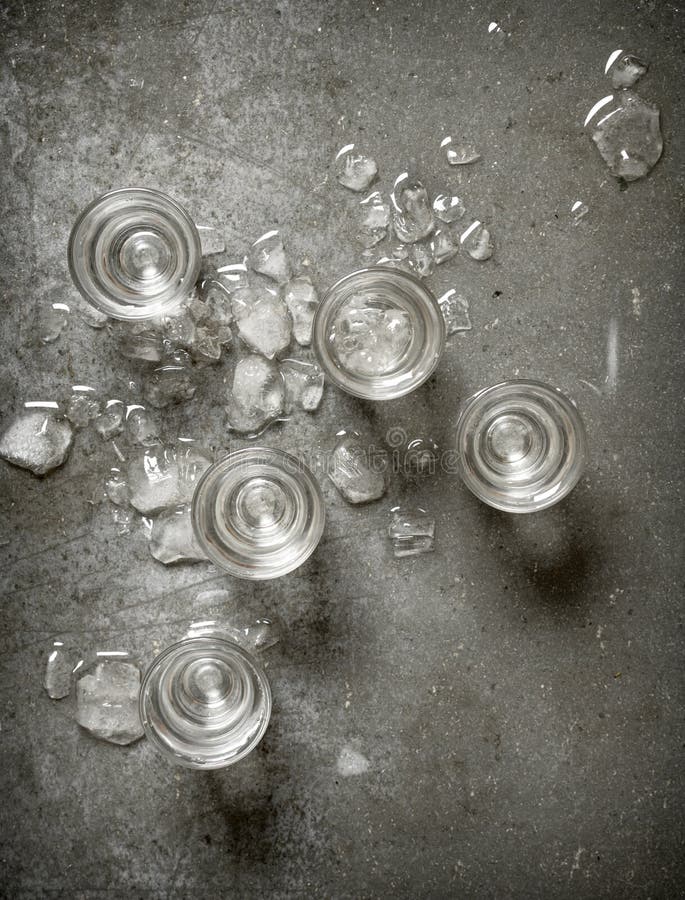 The vodka glass with ice. stock photo. Image of alcohol - 76656754