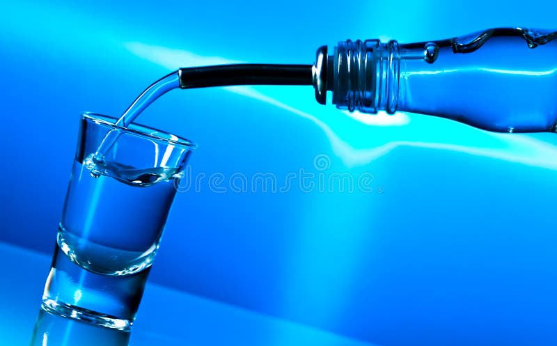 Vodka on glass table stock image. Image of neat, cocktail - 47207537