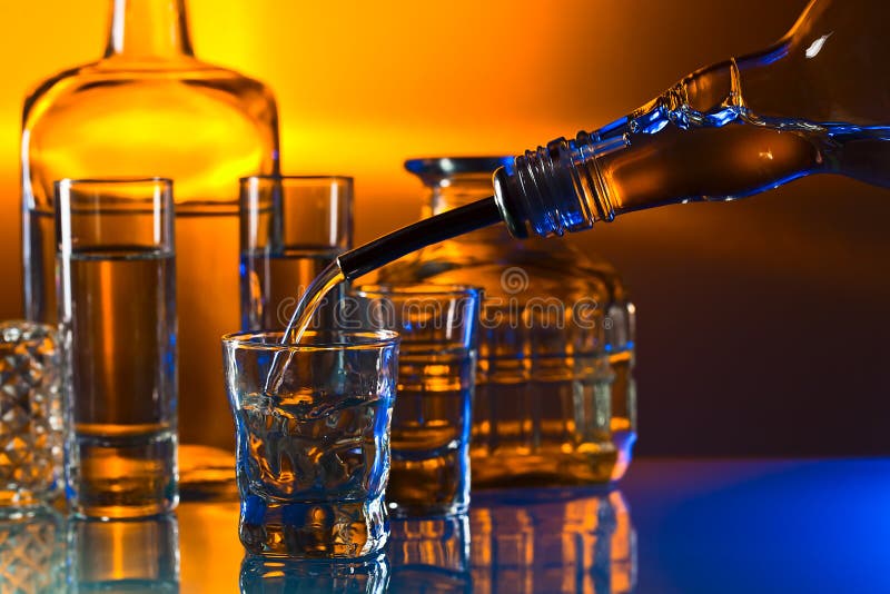 Vodka on glass table stock image. Image of drunk, liquor - 51218517