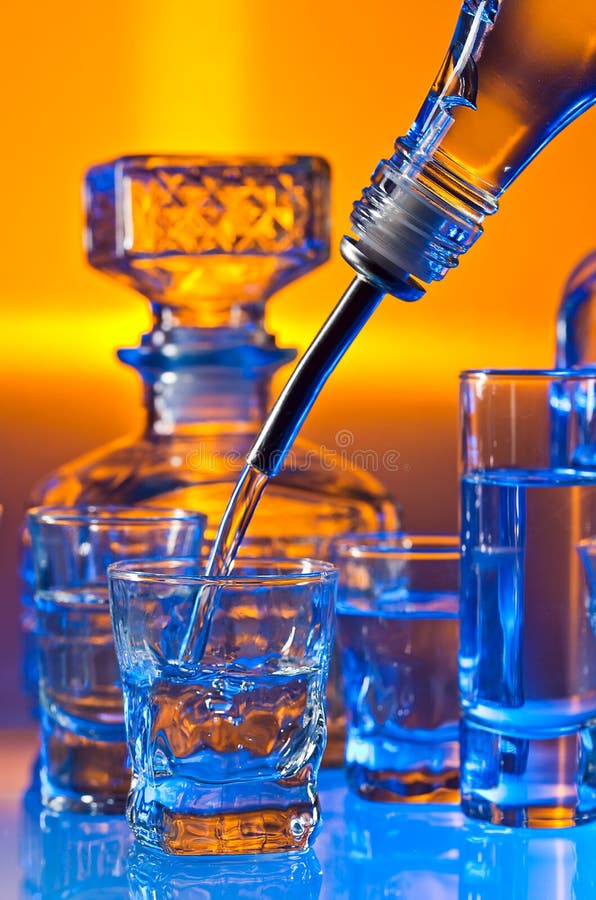 Vodka on glass table stock image. Image of spirit, decanter - 54628467