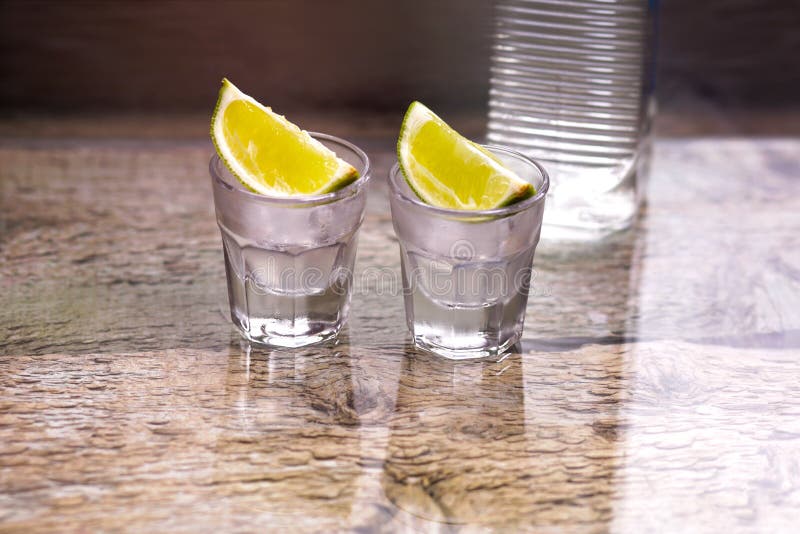 Vodka glasses on the table stock image. Image of horizontal - 66347405