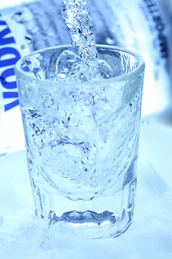 Vodka & ice stock image. Image of splashing, illumination - 12050075