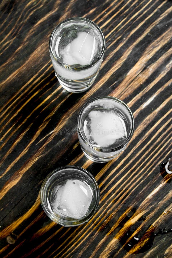 Vodka With Ice Cubes In A Shot Glass Stock Image - Image of beverage ...