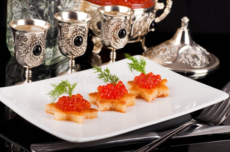 Vodka and red caviar stock image. Image of gourmet, snack - 29137309