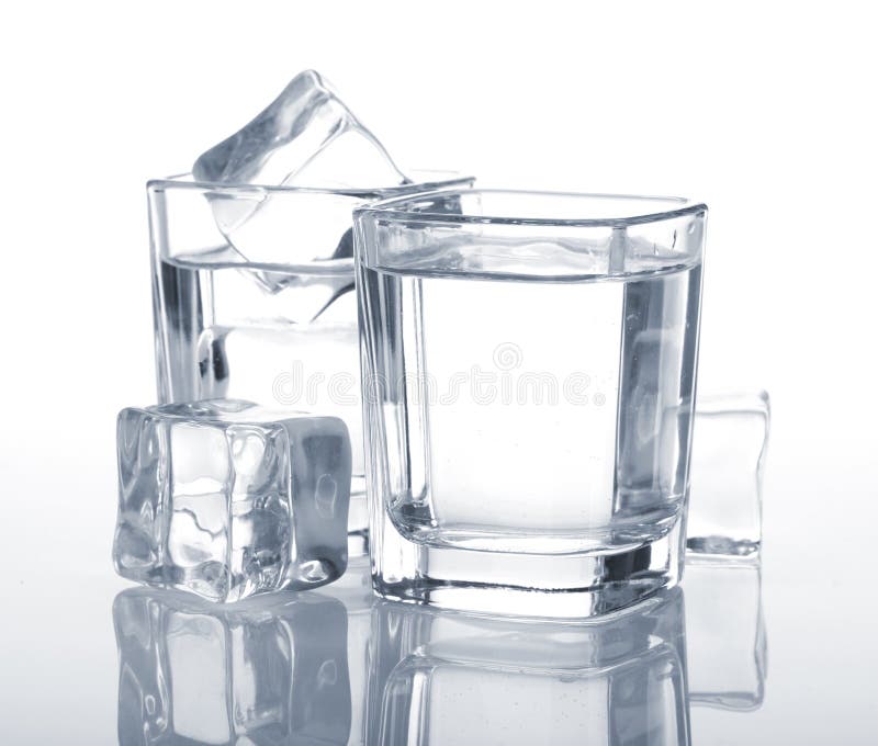 Vodka shots with ice cubes stock image. Image of blue - 27698193
