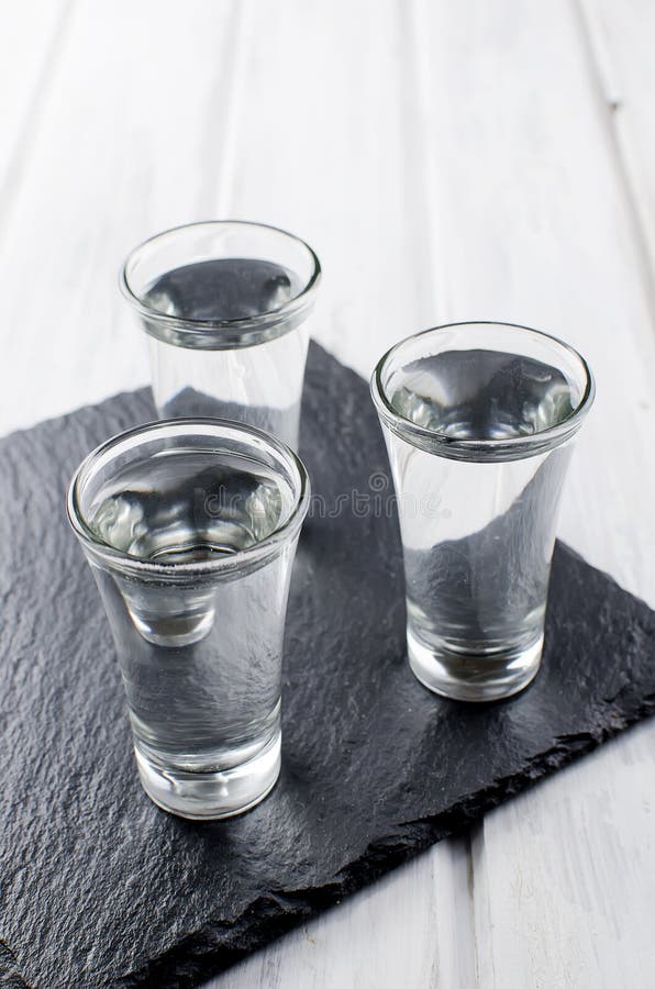 Vodka Shots on White Table. Banner Stock Photo - Image of vodka, shot ...