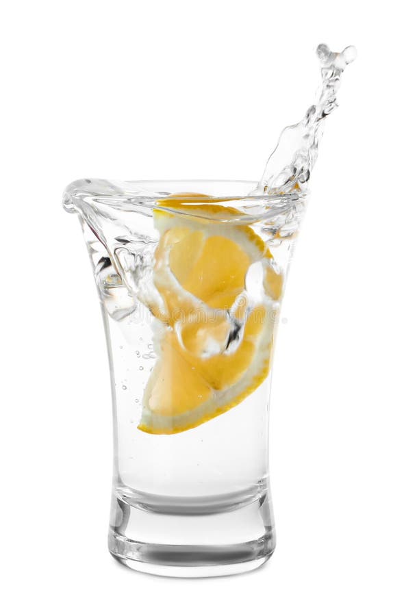 Vodka Splashing Out of Shot Glass with Lemon on White Background Stock ...