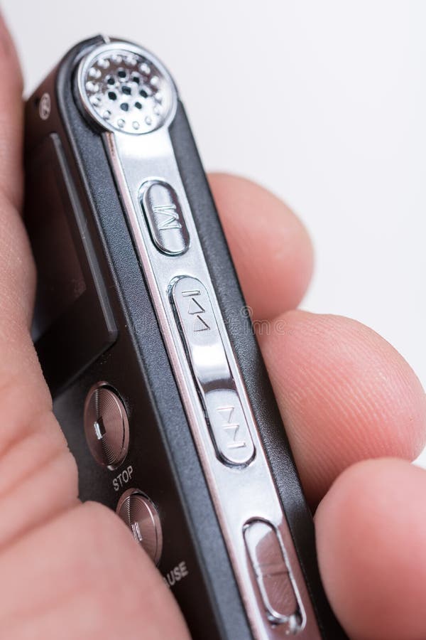 Voice recorder in the hand stock image. Image of capture - 63755963