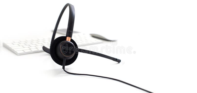 VOIP Headset on Laptop Computer Keyboard. Communication Support for ...