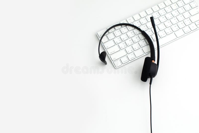 VOIP Headset on Laptop Computer Keyboard. Communication Support for ...