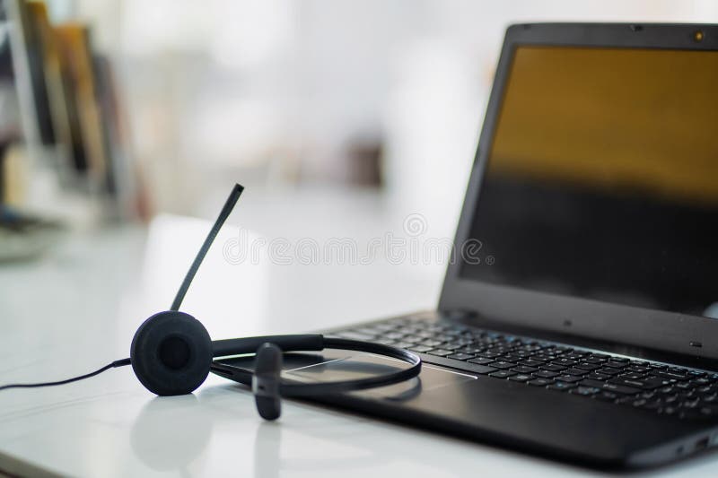 VOIP Headset and Notebook Computer Stock Photo - Image of consultant ...