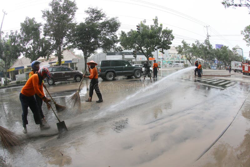 Volcanic ash clean up editorial stock image. Image of java - 37851599