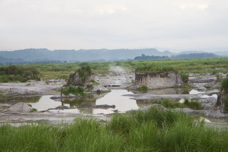 Volcanic Ashes Over a River Stock Photo - Image of land, aftermath ...
