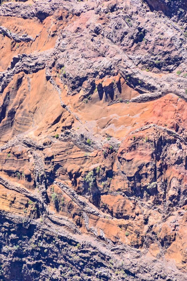 Basaltic Rock Structure among Red Volcanic Soil Stock Photo - Image of ...