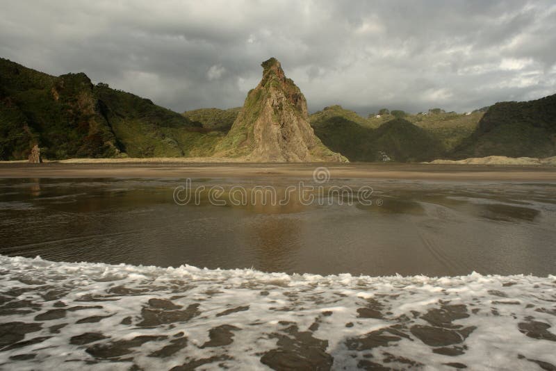 Volcanic beach after storm stock photo. Image of clouds - 43758824