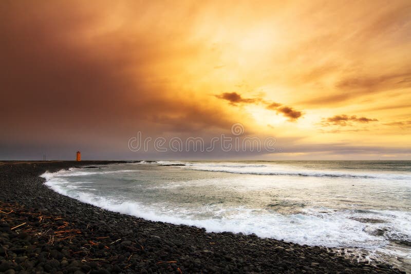 Volcanic beach sunset stock image. Image of icelandic - 58570717
