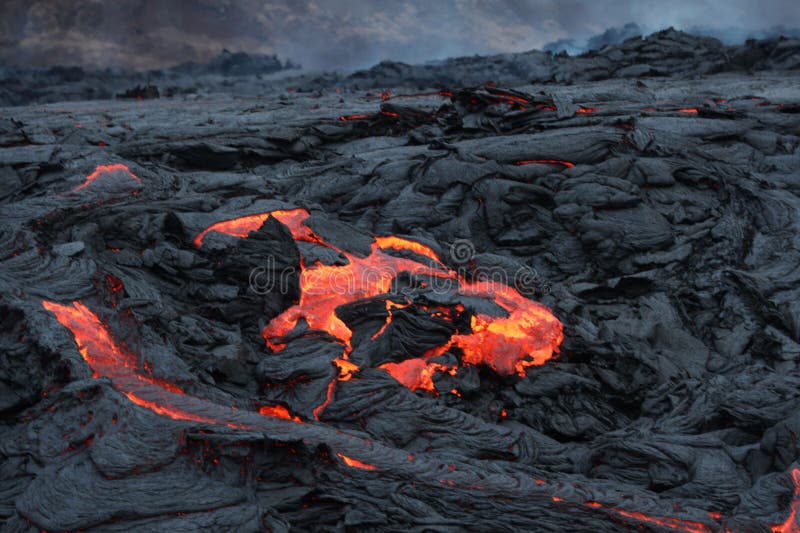 Volcanic Eruption with Glowing Orange Lava Flow Surrounded by a Pool of ...
