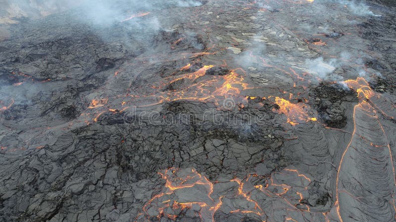 Volcanic Eruption with Glowing Orange Lava Flow Surrounded by a Pool of ...