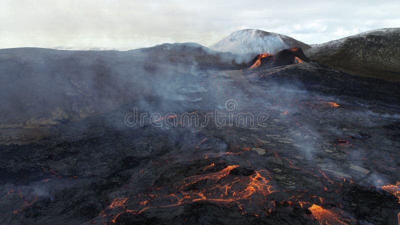 Volcanic Eruption with Glowing Orange Lava Flow Surrounded by a Pool of ...
