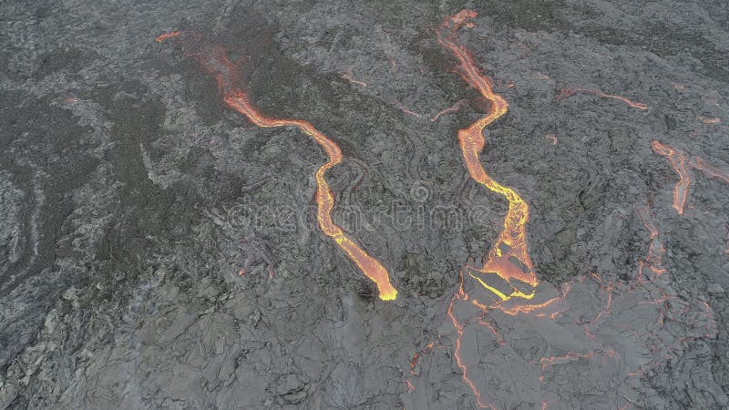 Volcanic Eruption with Glowing Orange Lava Flow Surrounded by a Pool of ...