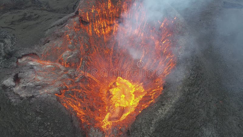 Volcanic Eruption with Glowing Orange Lava Flow Surrounded by a Pool of ...