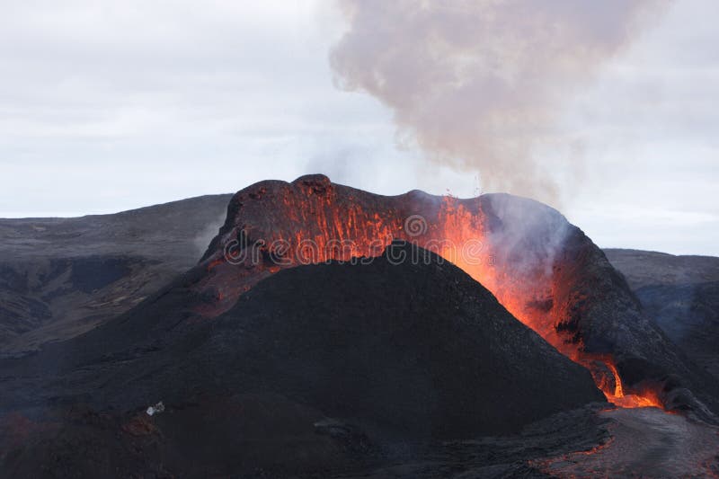 Volcanic Eruption with Glowing Orange Lava Flow Surrounded by a Pool of ...