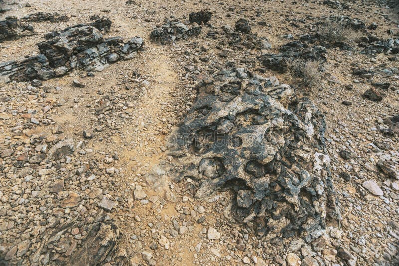 Volcanic ground path stock photo. Image of stone, ground - 218754222