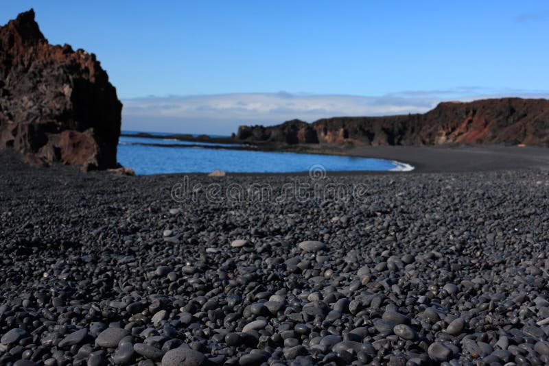 Volcanic pebble beach stock photo. Image of pebble, rest - 9209720