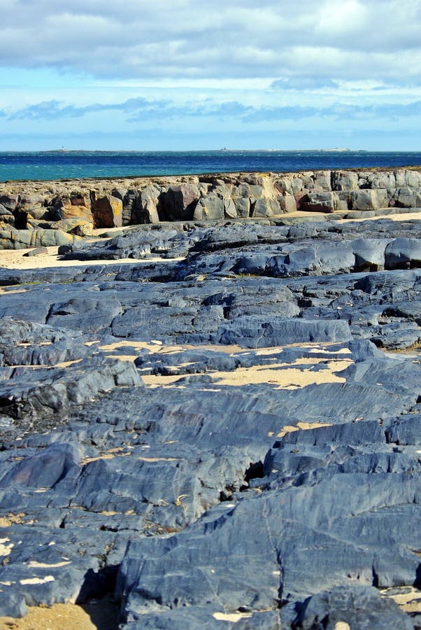 Volcanic rock beach stock image. Image of nature, seashore - 53507225