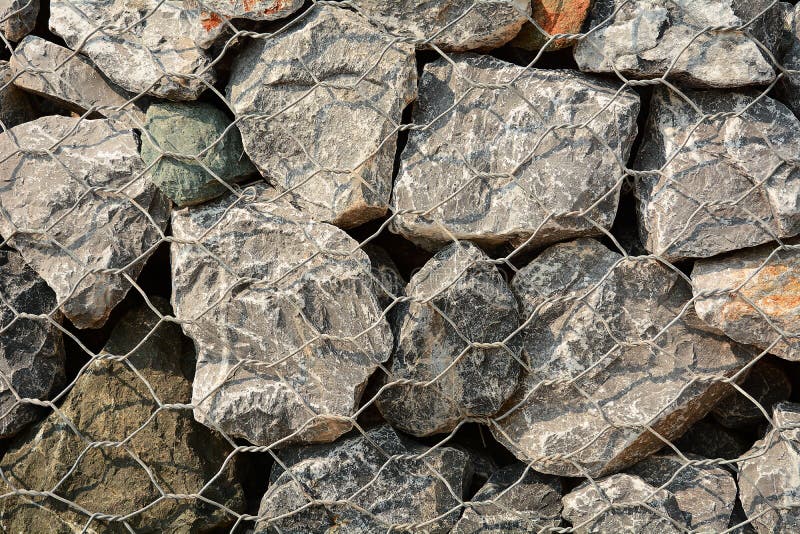 A Volcanic Stone and Steel Net Fence Texture Stock Image - Image of ...