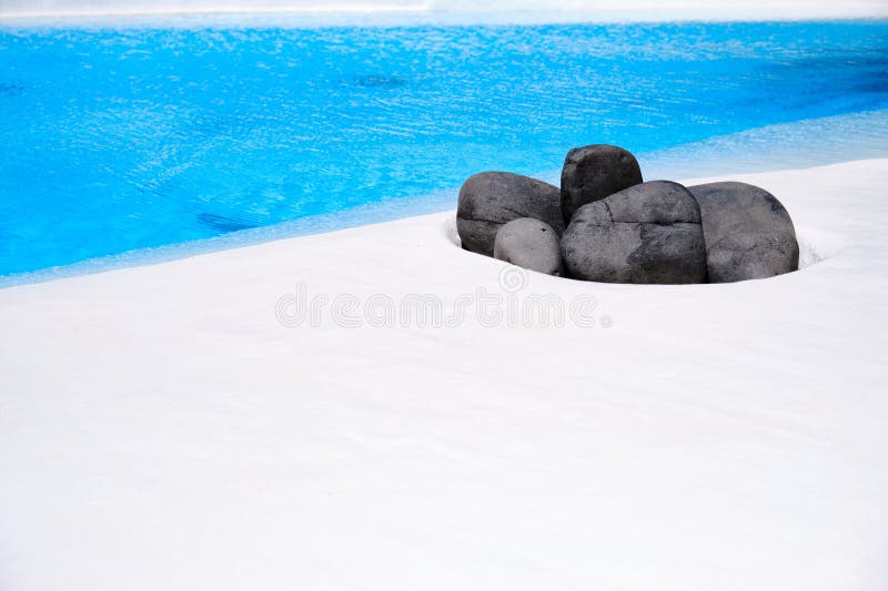 Volcanic Stones Next To a Swimming Pool. Stock Photo - Image of stone ...
