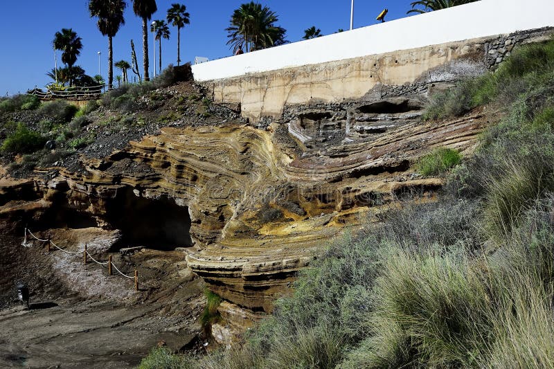 Volcanic strata stock image. Image of folded, palms, exposed - 40872681