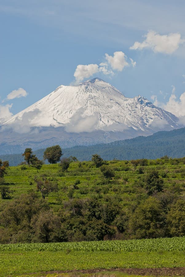 A volcano in a day sunny stock photo. Image of taking - 83970606