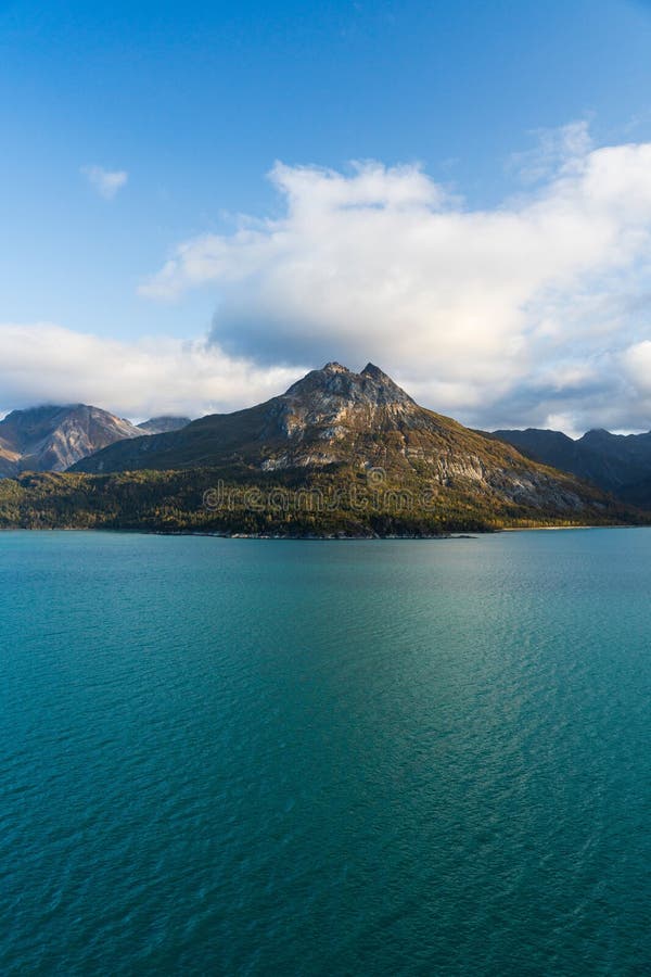 Volcano in Glacier Bay by the Lake, Vertical Stock Image - Image of ...