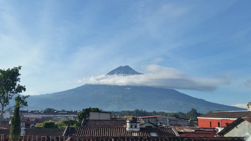 Volcano over city stock photo. Image of large, city, volcano - 88751982