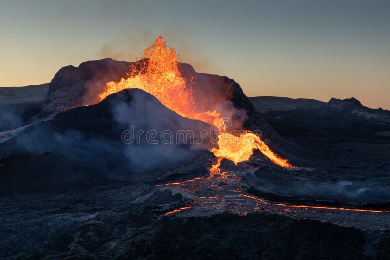 Volcano in sunset stock photo. Image of sunset, light - 222909520