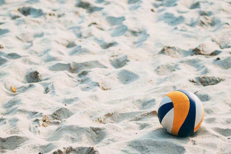 Volleyball Ball on a White Silky Sand at a Beach Stock Photo - Image of ...