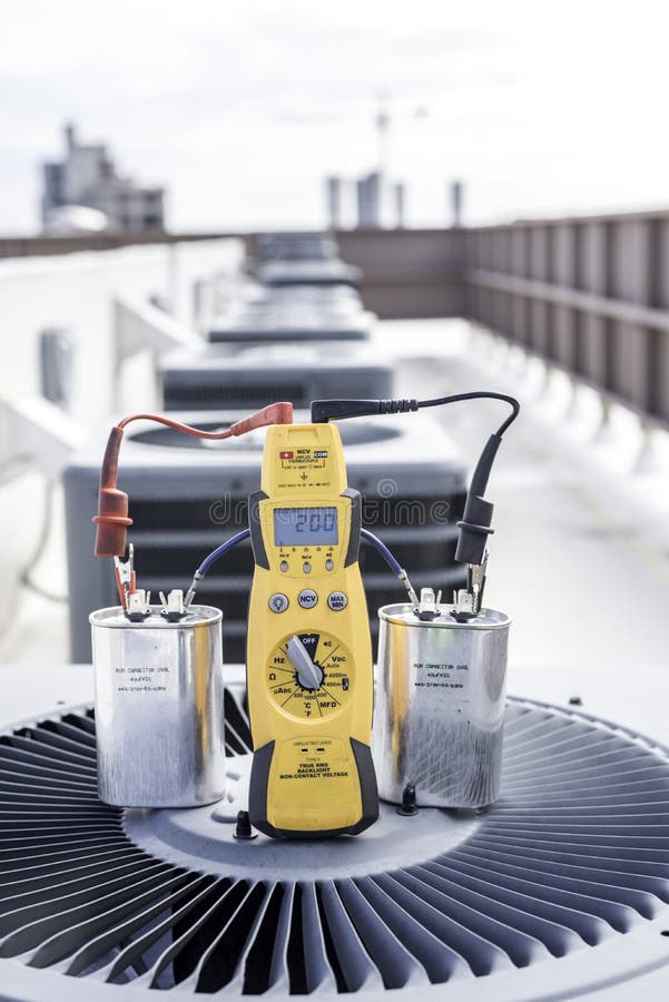 Voltage Meter and Capacitors Stock Photo - Image of industry, capacitor ...