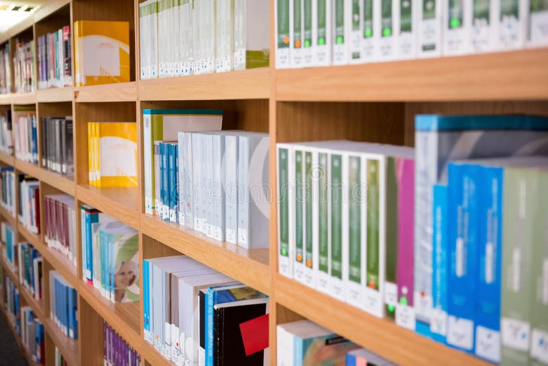 Volumes of Books on Bookshelf in Library Stock Photo - Image of ...