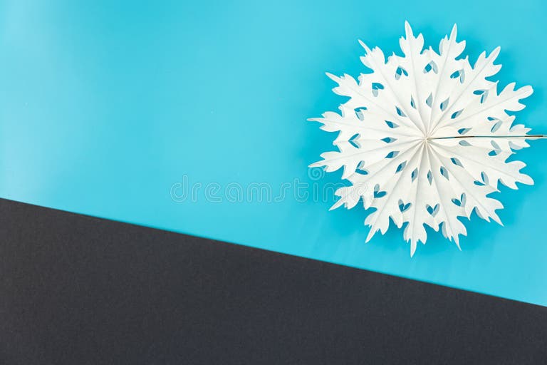 Volumetric Paper Snowflake on a Colored Background, Flat Lay. Stock ...
