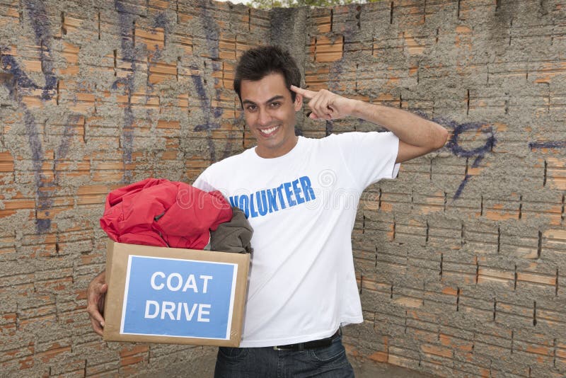 Volunteer with Coat Drive Donation Box Stock Image - Image of cheerful ...